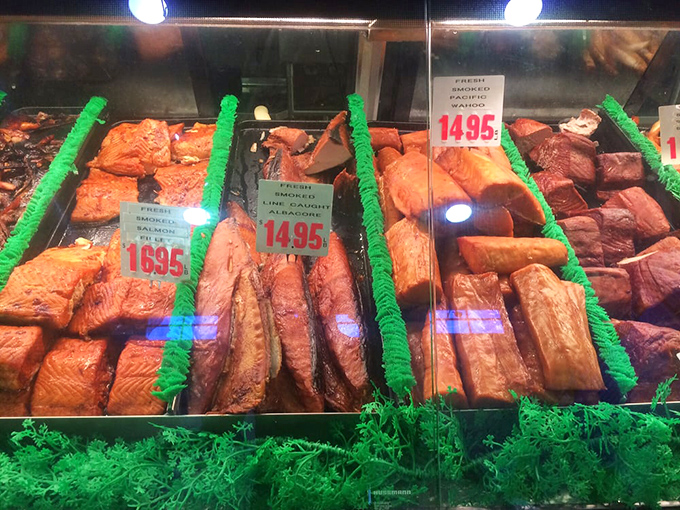 Smoked fish display that would make Neptune himself stop for a snack. These rosy fillets have that perfect kiss of smoke.