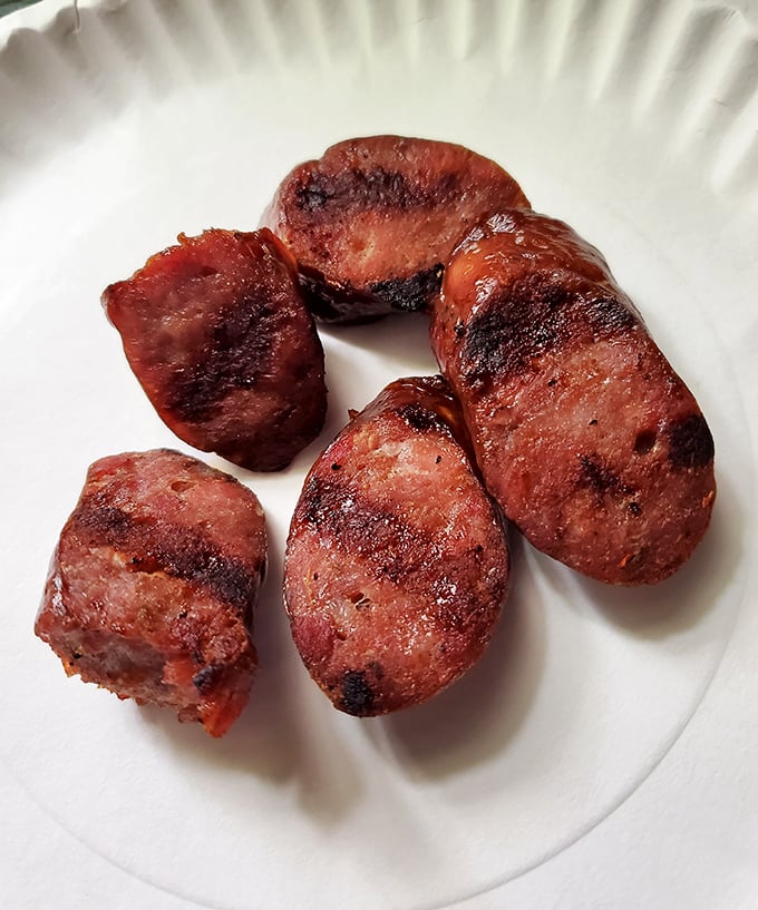 Behold the star of the show—kielbasa slices glistening with smoky perfection, each bite a reminder that simplicity often trumps culinary showboating.