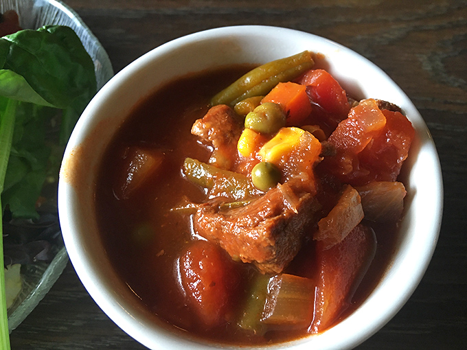 This isn't just soup – it's a bowl of liquid sunshine. Chunks of vegetables and meat swimming in harmony, waiting to warm you from the inside out.