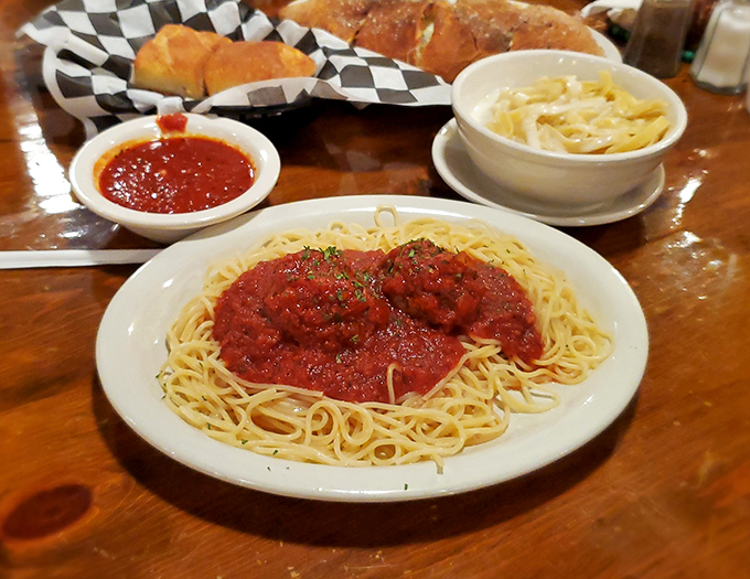 Classic spaghetti and meatballs served with a side of nostalgia. This isn't just pasta—it's a warm hug from an Italian grandmother you never knew you had.