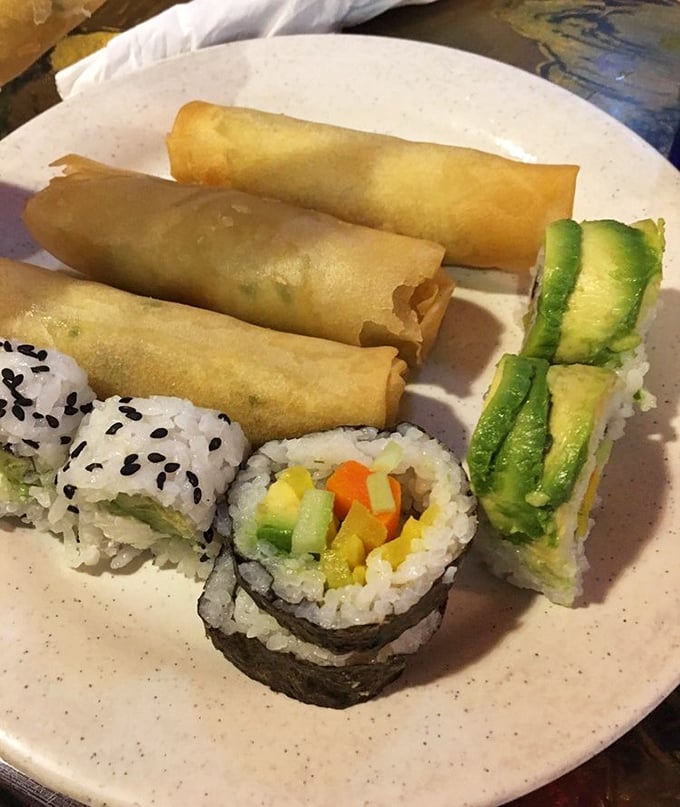 Spring rolls and sushi share space with perfect harmony – proof that on a good buffet plate, traditional boundaries deliciously dissolve.