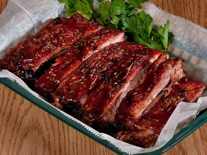 These St. Louis-style ribs aren't "falling off the bone"—they're doing something better: offering the perfect resistance before surrendering in a glaze of sticky glory.