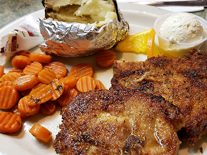Golden-brown pork chops with perfectly cooked carrots – proof that lunch at Beeline Cafe deserves just as much fanfare as their legendary breakfasts.
