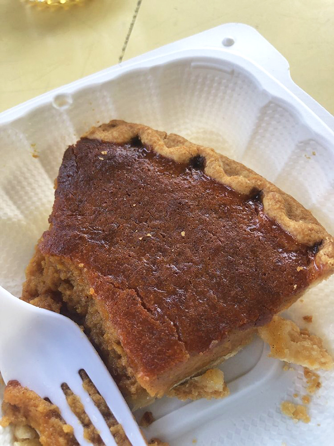 Sweet potato pie with a caramelized top that crackles under your fork like nature's crème brûlée—soul food that actually feeds your soul. 