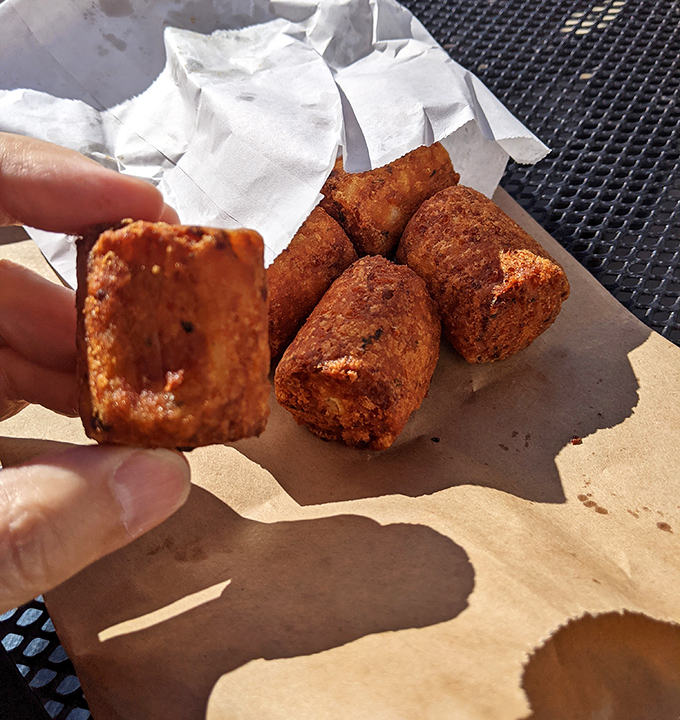These golden-brown nuggets of potato perfection aren't just side dishes—they're supporting actors that deserve their own standing ovation.