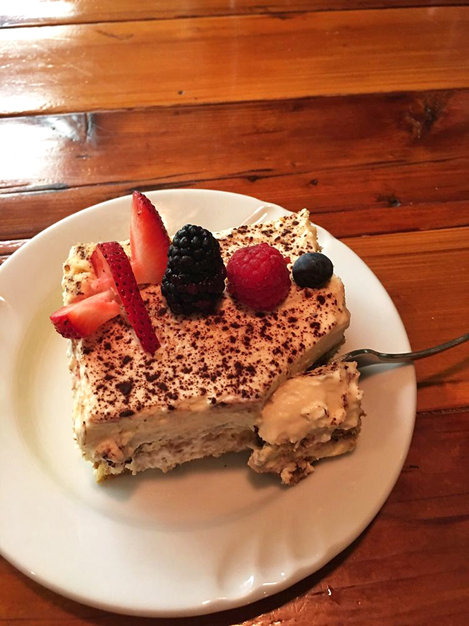 Tiramisu with fresh berries that doesn't just satisfy your sweet tooth—it throws a tiny festival for it. Coffee, cream, and joy in every bite.