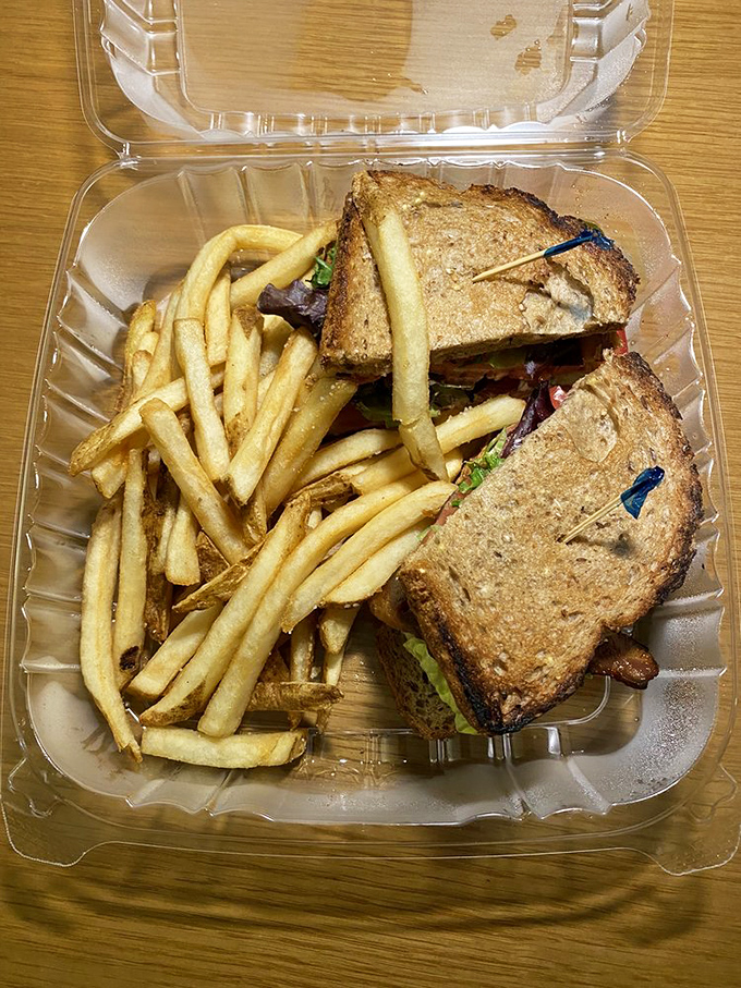 Even takeout gets the royal treatment—this sandwich and fries combo proves good food travels well, though it probably didn't make it home.
