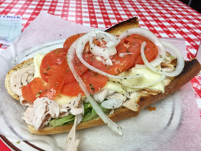 Fresh ingredients stacked with architectural precision – this turkey and Swiss creation isn't just a sandwich, it's edible engineering at its finest.