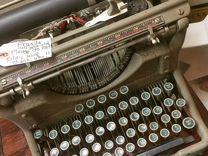"Fragile! Please pay for it!" warns the note on this typewriter—a relic from when writer's block came with actual keys to press.