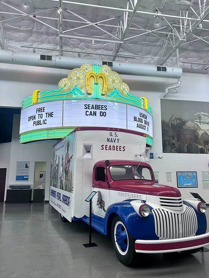 The Seabee Museum's vintage recruitment truck looks ready for its Hollywood close-up. This beautifully preserved piece of military history sits beneath a marquee worthy of a classic theater.