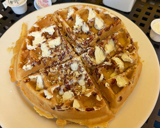 These golden waffles with butter and pecans aren't just breakfast – they're an edible love letter to morning indulgence that would make Leslie Knope weep with joy.