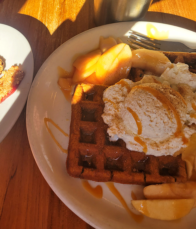 Waffles aren't merely breakfast at Lucky's—they're an art form topped with seasonal fruit and whipped cream that would make Belgian waffle masters weep with joy.