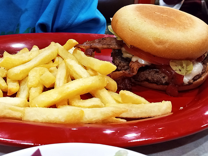 This isn't just a burger—it's a declaration of beef independence. Those fries look like they're auditioning for a supporting actor award.