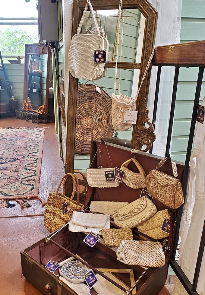 Woven bags from another era hang like exotic fruit, ready to be plucked and paraded down modern streets.