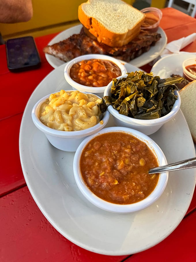 Four bowls of Southern comfort, where mac and cheese meets its soulful companions in delicious harmony.