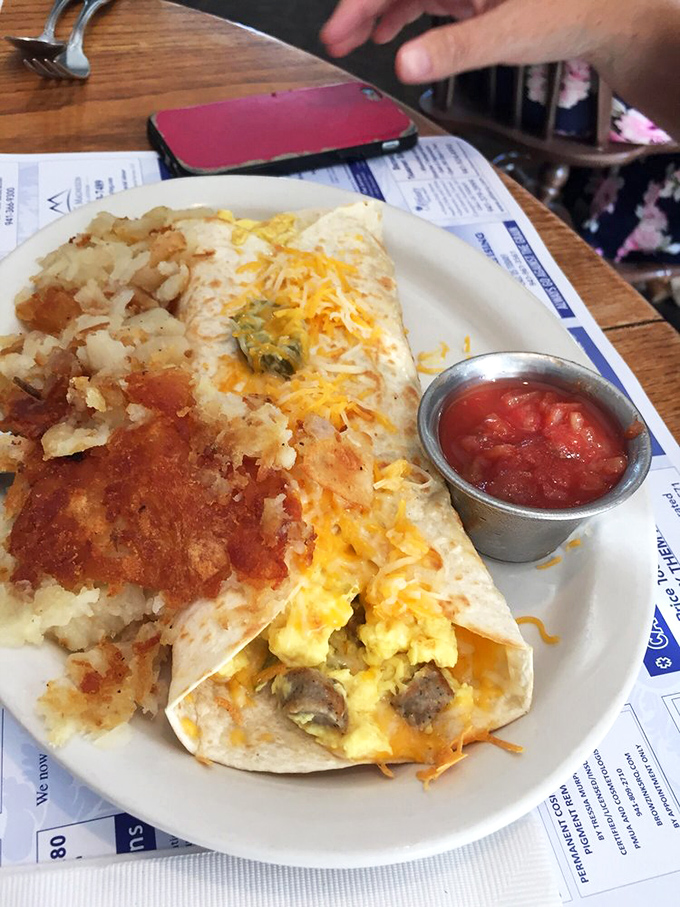 This breakfast burrito doesn't just start your day—it launches it into orbit with eggs, cheese, and potatoes, with salsa standing by for extra liftoff.