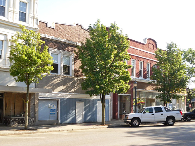 Downtown storefronts maintain their dignified brick facades, like old-timers who've seen it all but still put on a clean shirt every morning.