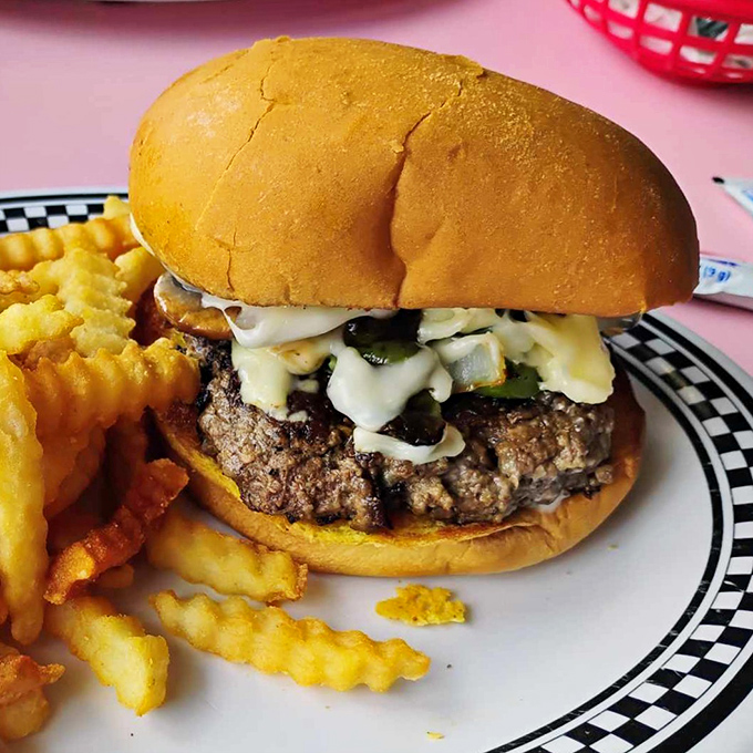 A burger that doesn't need fancy aioli or artisanal nonsense—just honest ingredients stacked with the confidence of a diner that knows its worth.