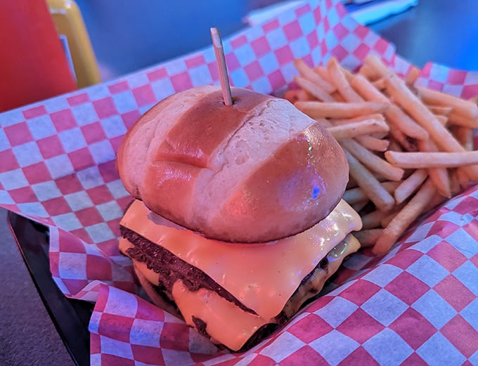 This isn't just a cheeseburger—it's architecture. The perfect stack of beef, cheese, and bun that makes fast food chains weep with inadequacy.