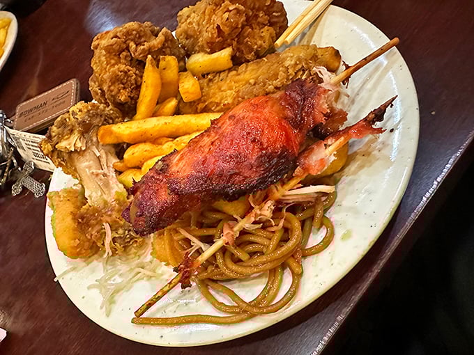 The ultimate buffet plate of champions—fried chicken, BBQ, noodles, and fries sharing real estate like friendly neighbors who don't mind touching.