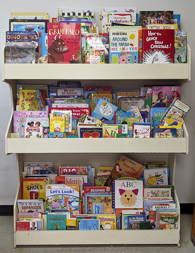 Children's books stacked like colorful time machines, ready to transport a new generation to worlds of Gruffalos and Grinches.