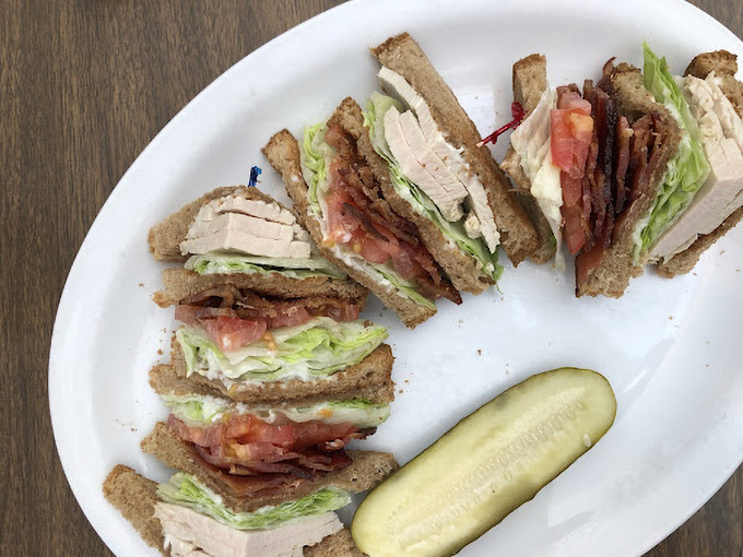 The club sandwich—architecture you can eat! Perfectly stacked layers that would make Frank Lloyd Wright proud.