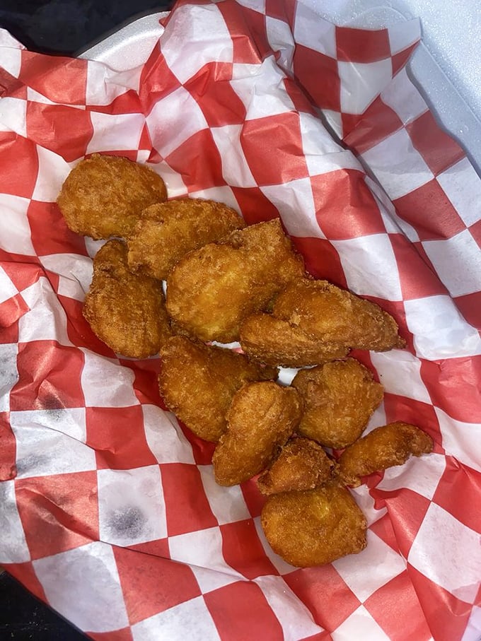 Golden-fried nuggets of Southern comfort that make you question why corn ever bothered growing any other way. Dipping sauce not optional.