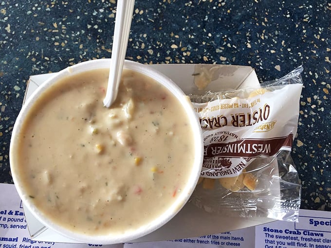 A bowl of creamy crab chowder paired with an ice-cold Modelo—proof that sometimes life's simplest pleasures are also its most profound.