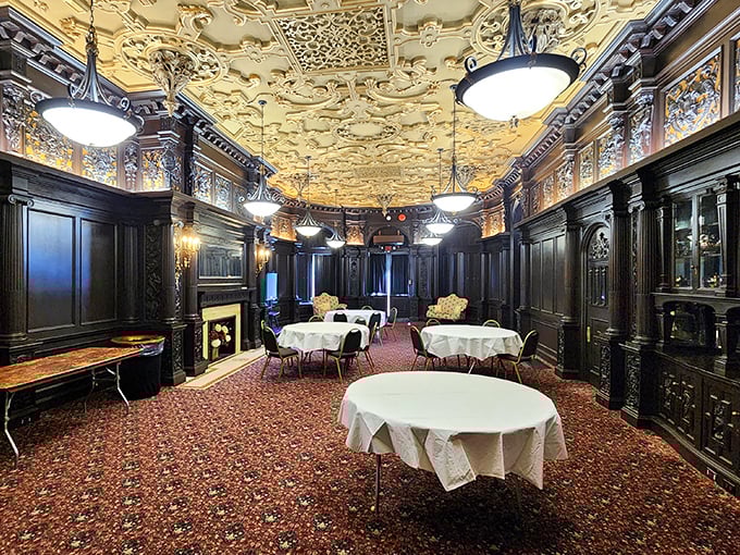 Gilded Age dining at its finest. With that ornate ceiling and dark wood paneling, you half expect a butler to appear with a silver tray of appetizers.