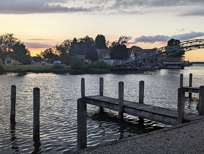 This weathered dock has witnessed thousands of fishing tales—each one growing slightly taller than the last with every retelling.