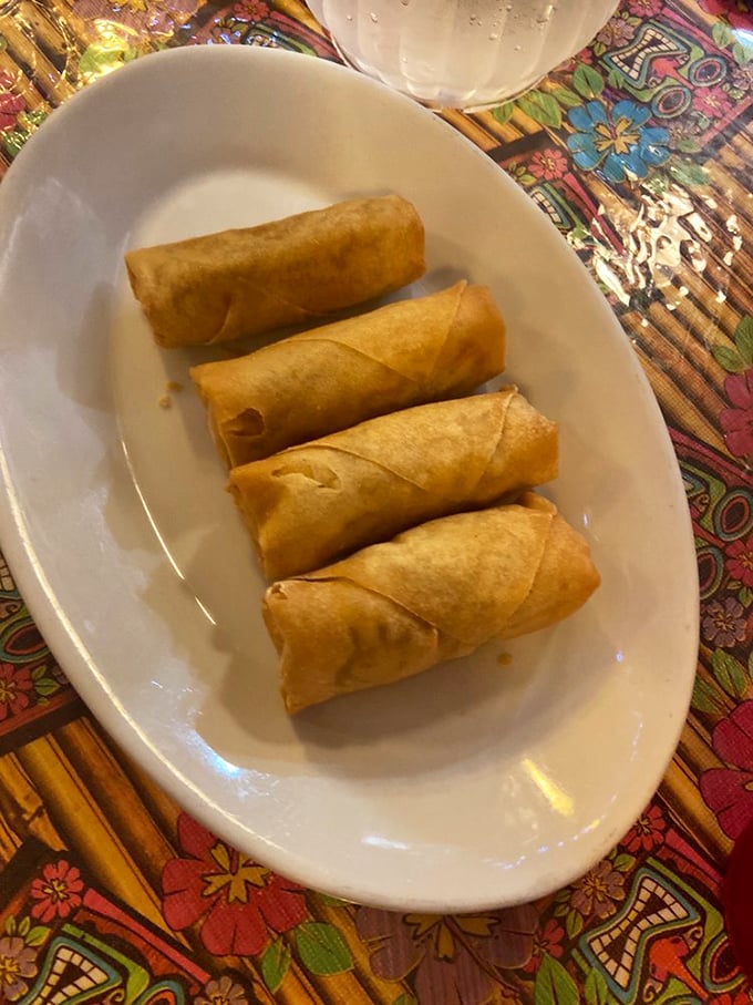 Egg rolls with that perfect shattering crunch—the culinary equivalent of breaking into a crème brûlée, but with savory rewards inside.