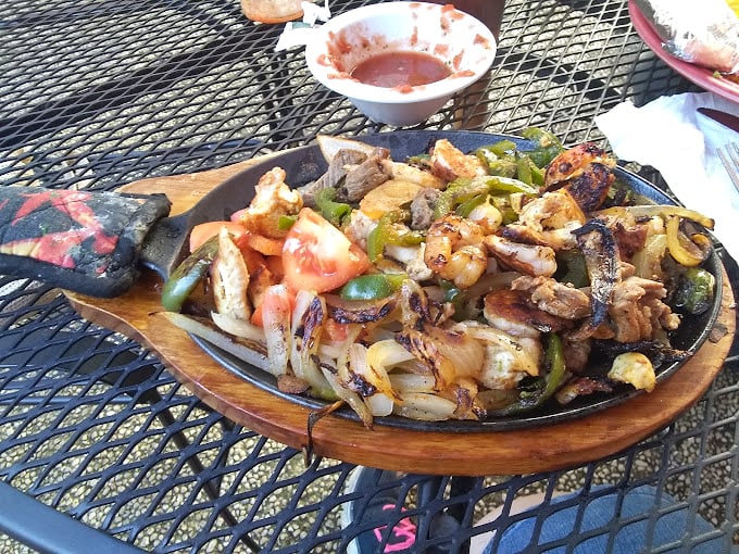 Sizzling fajitas that don't just arrive at your table—they make an entrance, turning heads and making stomachs growl three tables away.