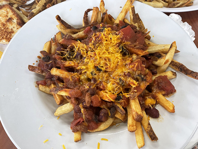 These aren't just chili cheese fries—they're a beautiful mess of comfort that requires both a fork and absolutely zero shame. Worth every napkin you'll need.