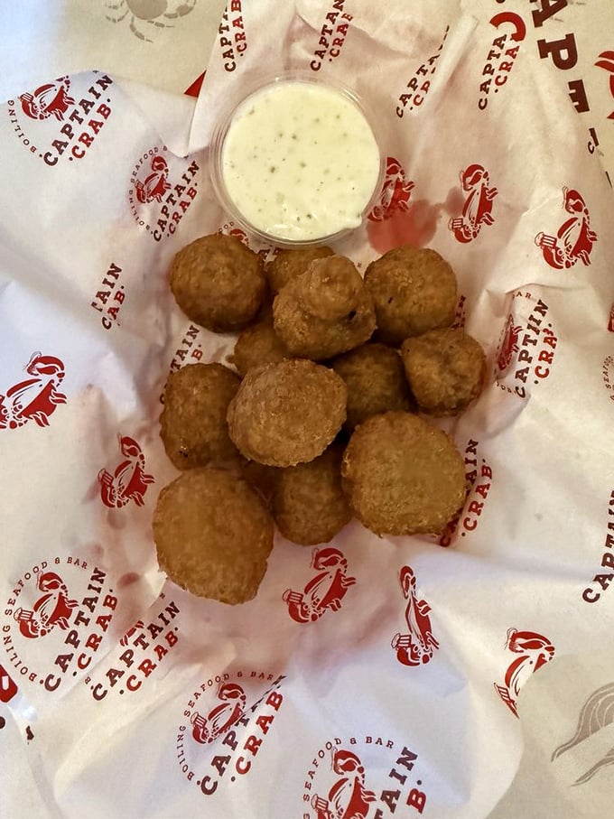 Golden-fried mushroom bites that crunch like nature's popcorn. The dipping sauce is just showing off at this point.