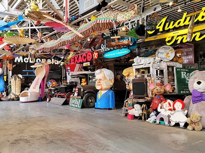 Giant shoes, presidential heads, and teddy bears create a surreal landscape. It's like walking through America's collective garage sale curated by Salvador Dalí.