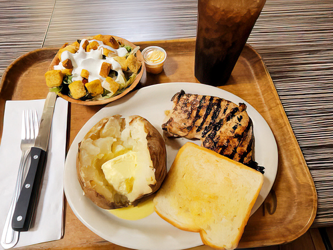 Grilled chicken that actually tastes like chicken should – juicy, flavorful, and without pretension. The butter-melting-on-Texas-toast situation is pure poetry.