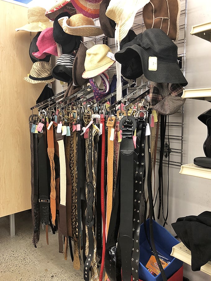 The accessories wall – where belts, hats, and fashion statements hang in anticipation. Like a buffet of style options, there's something for every taste.