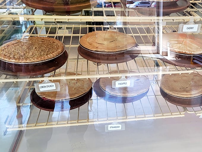 The display case at Mehaffie's is the dessert equivalent of a museum gallery. Each pie a masterpiece, patiently waiting for appreciation.