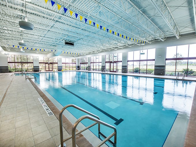 The indoor pool: where Florida's "but it might rain later" excuse meets "I'm swimming laps anyway." Climate control at its finest.