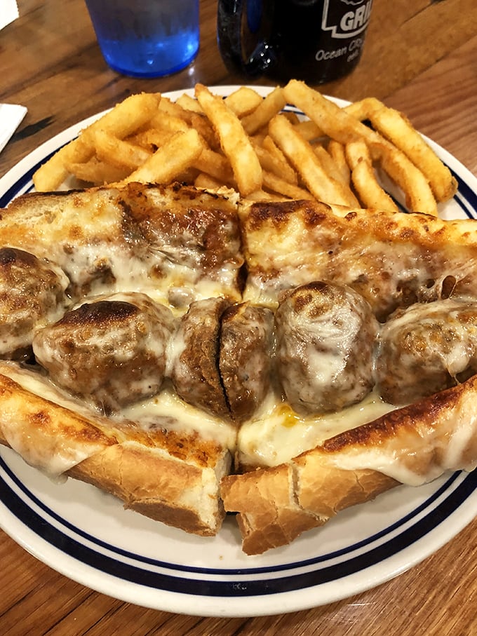 This isn't just a meatball sandwich – it's an architectural marvel of melted cheese, seasoned meatballs, and bread sturdy enough for the challenge. 