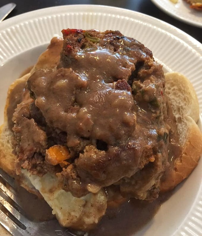 Mike's Meatloaf Sandwich – where comfort food goes to show off. This open-faced beauty smothered in gravy is the culinary equivalent of a warm hug.