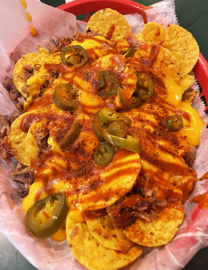 BBQ nachos that don't know the meaning of restraint – cheese, jalapeños, and pulled pork creating a flavor fiesta that demands to be shared.