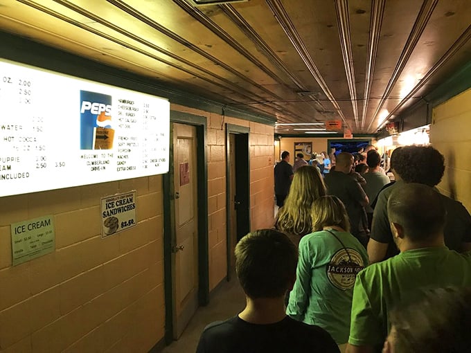 The intermission rush proves that movie theater popcorn just hits different under the open sky.