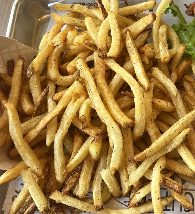These aren't just fries—they're potato royalty. Hand-cut, perfectly crisp, and seasoned with such precision they deserve their own fan club.