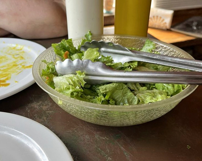 The obligatory salad course—a crisp, refreshing prelude to the meat marathon ahead. Even cowboys need their greens.