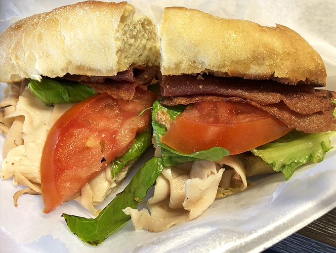 Even the sandwiches deserve their moment in the spotlight. This turkey club is stacked higher than my hopes for dessert—and that's saying something.