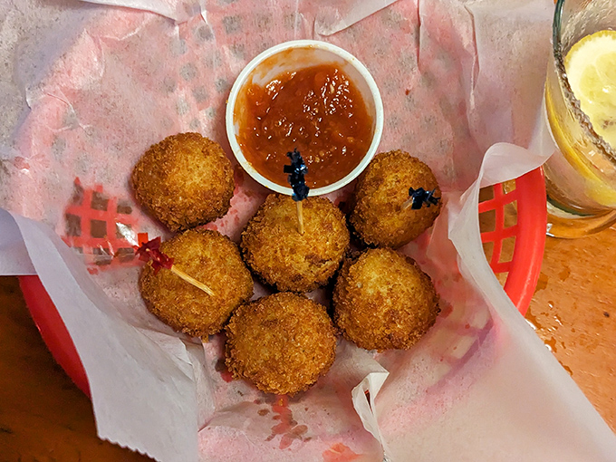 Golden-fried sauerkraten balls – crunchy on the outside, savory on the inside – the kind of appetizer that disappears faster than your willpower.