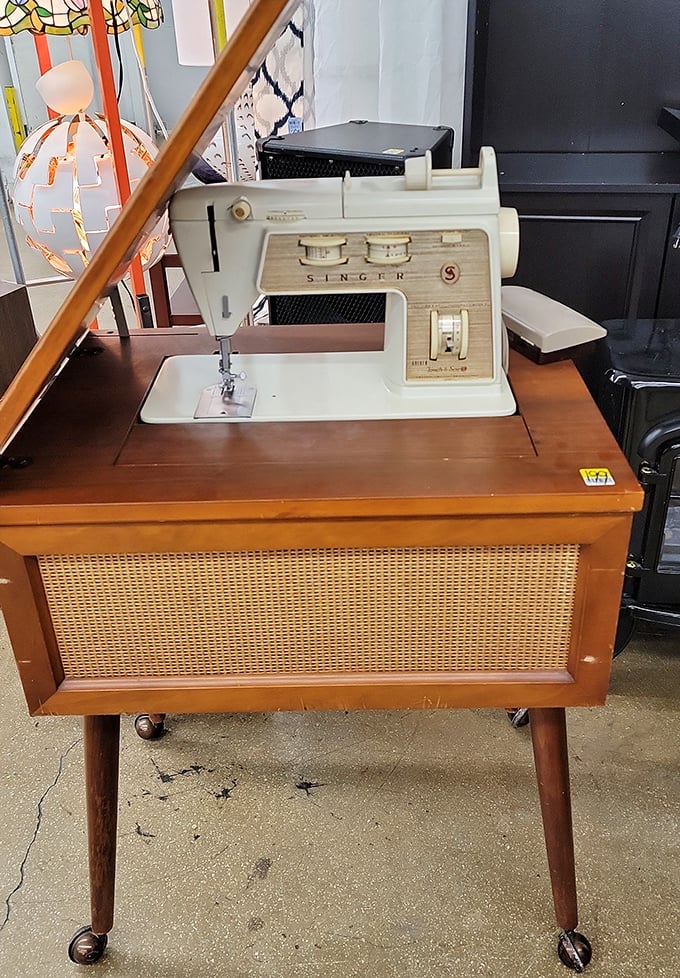 This vintage Singer sewing machine isn't just furniture – it's a time capsule of craftsmanship from when things were built to outlast their owners.
