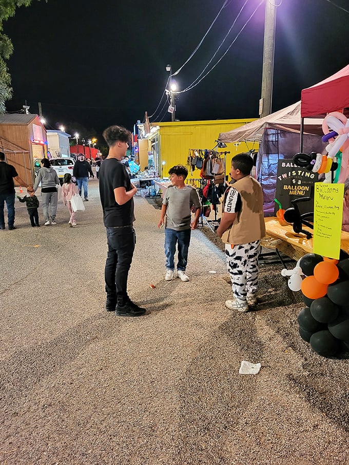 Young friends gather under the night sky, surrounded by stalls of possibility. Every conversation at the swap meet begins with "Look what I found!"
