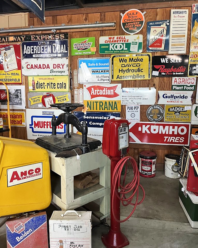 A wall of vintage advertising that puts modern marketing to shame. When signs were art and slogans were poetry.
